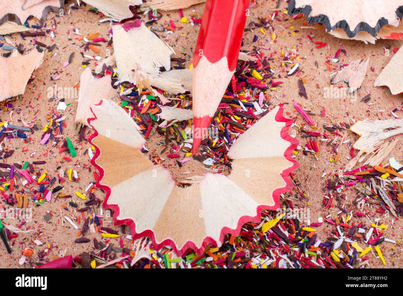 Red Color Pencil over some pencil shavings Stock Photo - Alamy