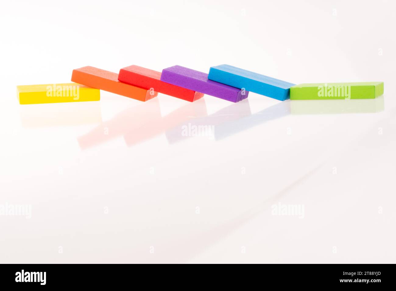 Multi color domino on white background Stock Photo - Alamy