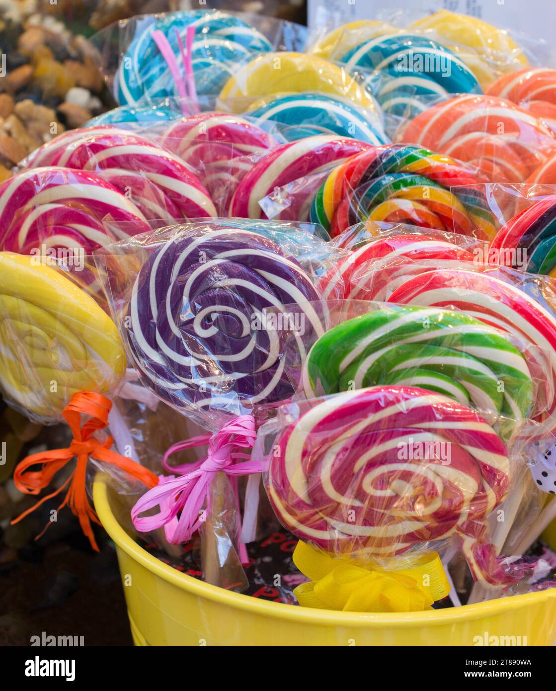 Delicious colorful swirl candy and sweets for kids Stock Photo - Alamy