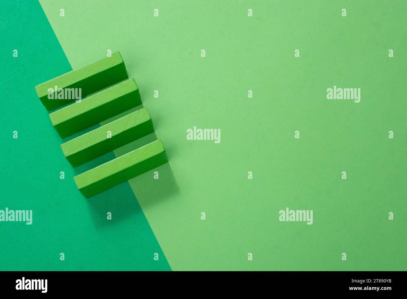 Green color domino blocks placed in view Stock Photo - Alamy