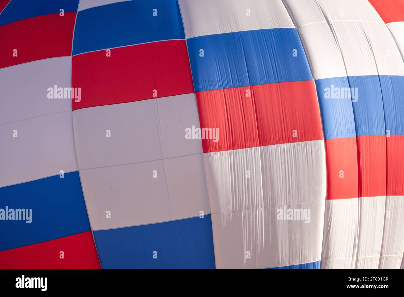 Detail of the red, white, and blue checkered panels of a hot air ...