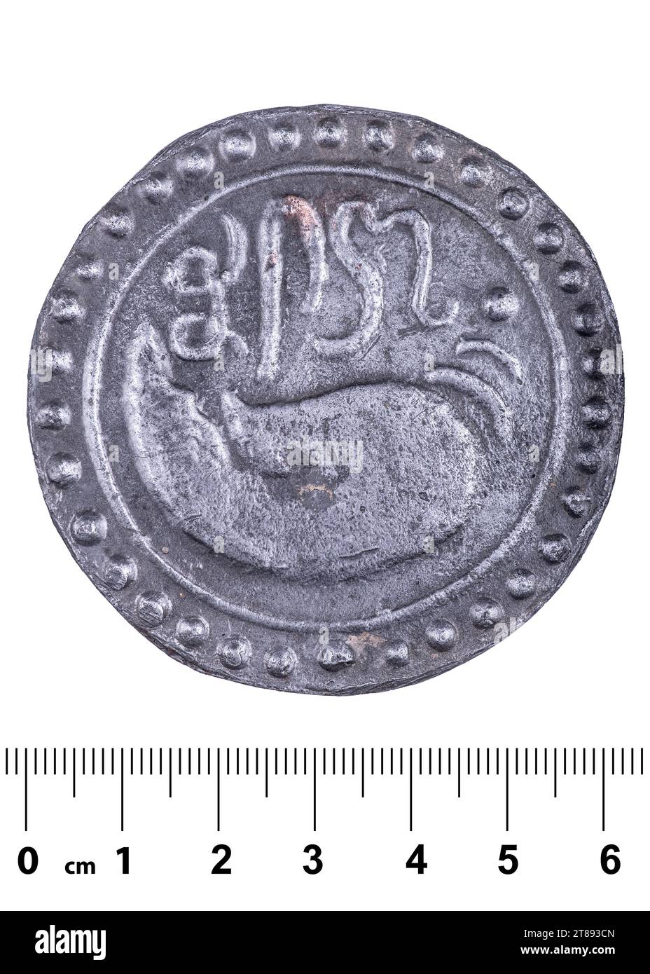 An ancient coin of the kingdom of Funan with a picture of a shell and ...
