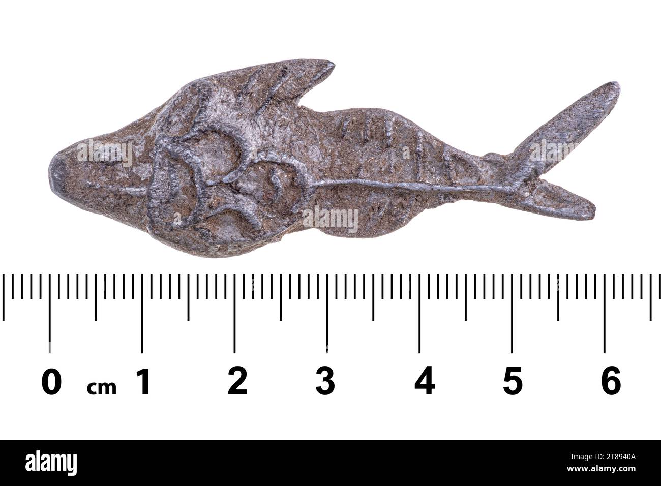 Ancient malaysian fish tin coin. Isolated on white Stock Photo - Alamy