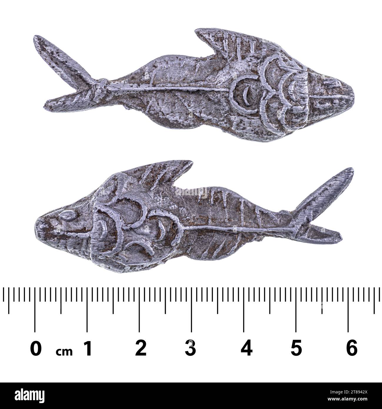 Antique malaysian fish tin coin. Isolated on white Stock Photo - Alamy