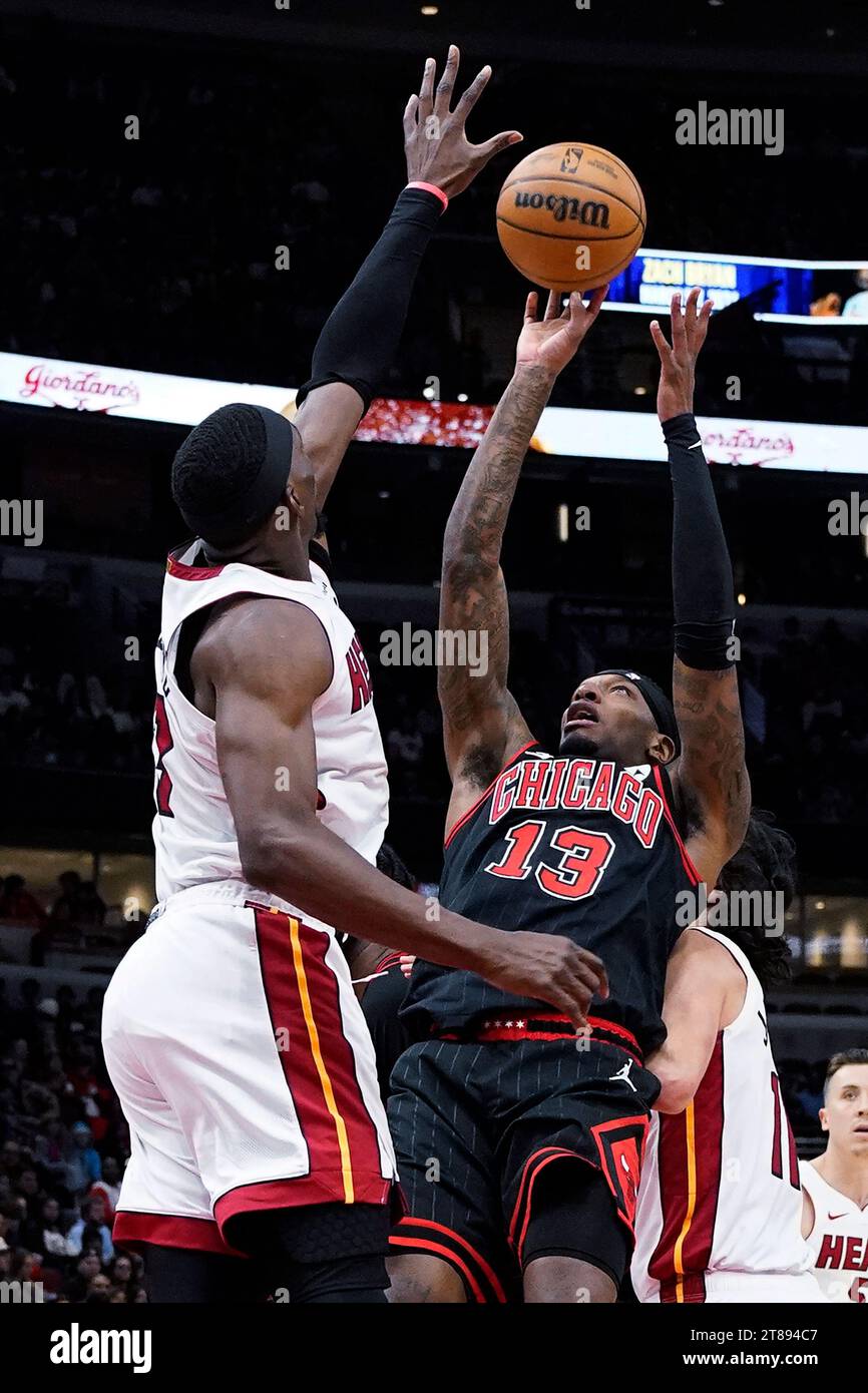 Chicago Bulls forward Torrey Craig, right, shoots against Miami Heat ...