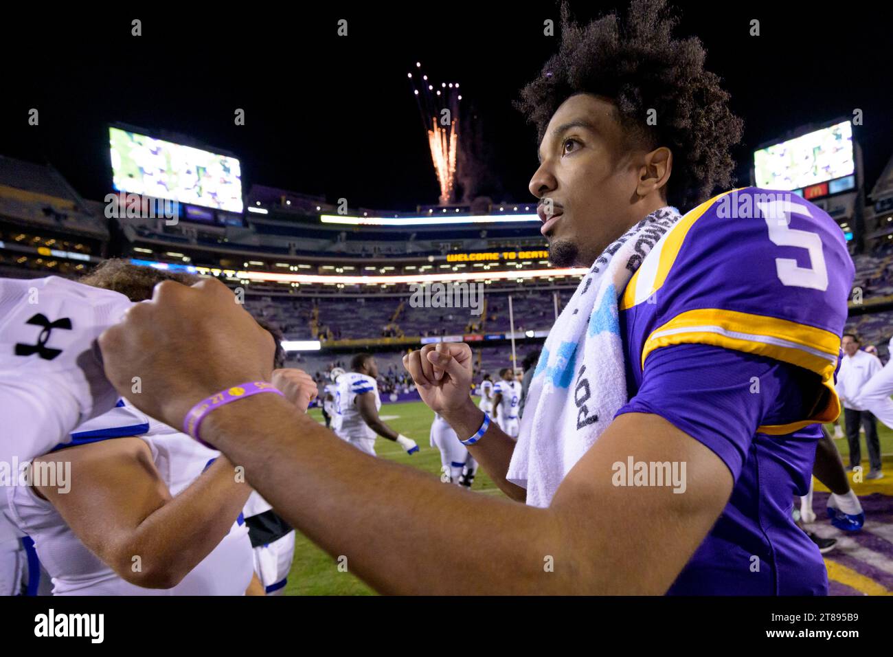 LSU quarterback Jayden Daniels (5) bumps fists with Georgia State ...