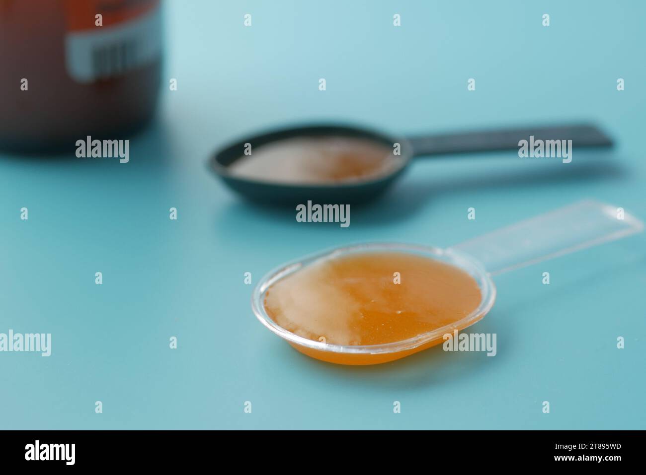 A dose of cough syrup Stock Photo - Alamy