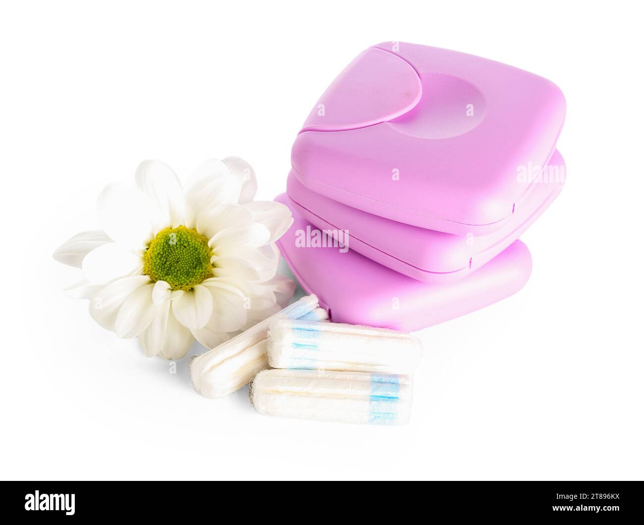 Menstrual tampons, storage boxes and chamomile flower on white ...