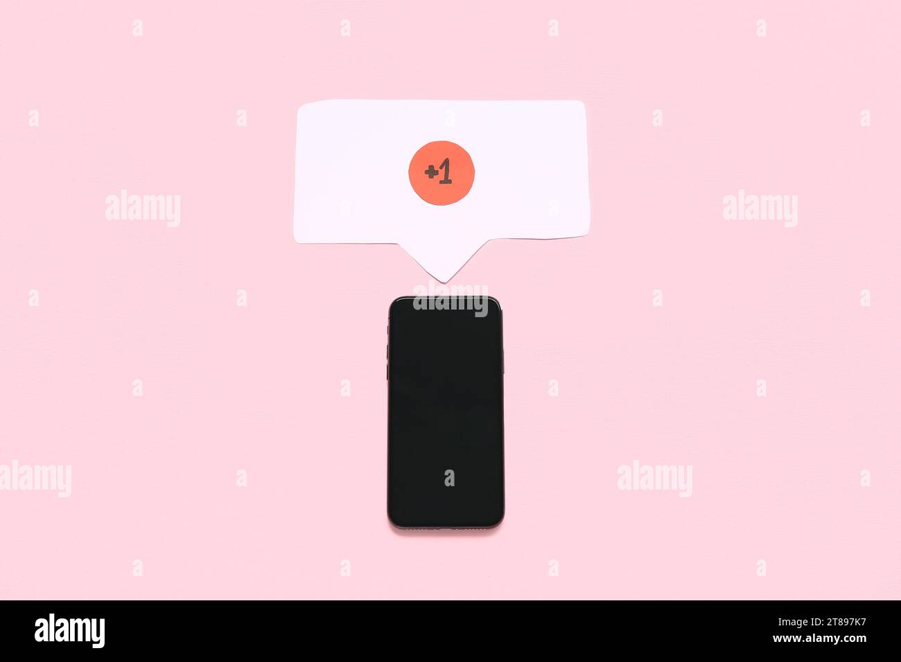 Mobile phone with blank screen and speech bubble with +1 icon on pink ...