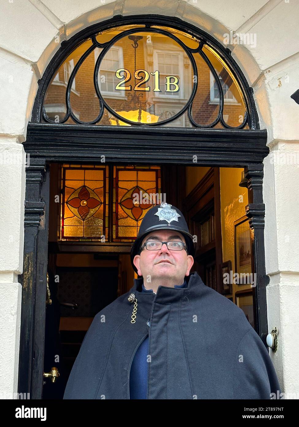London, UK. 16th Nov, 2023. An employee dressed as a policeman stands ...