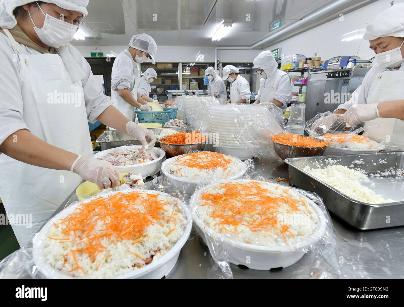 Employees make Kinki-no-Izushi, a food made by lactic acid fermentation ...
