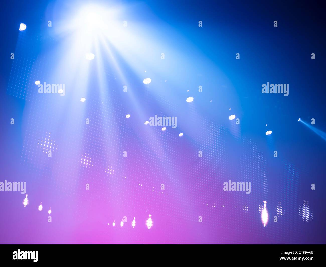 spotlights or light beams on-stage performance, concert, shining ...