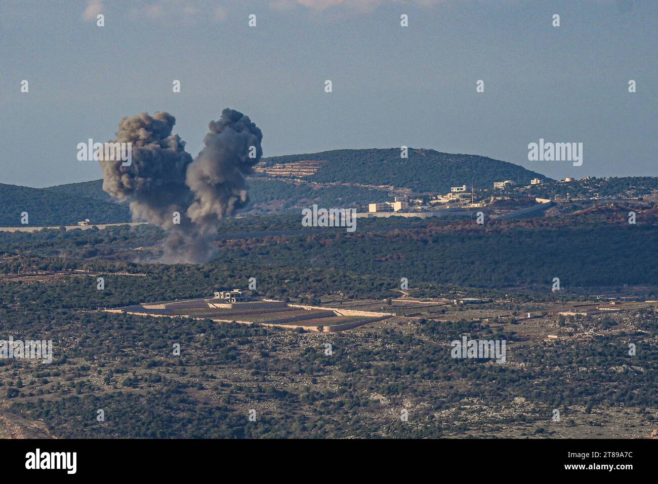 (231119) -- MOSHAV DOVEV, Nov. 19, 2023 (Xinhua) -- Smoke rises from a ...