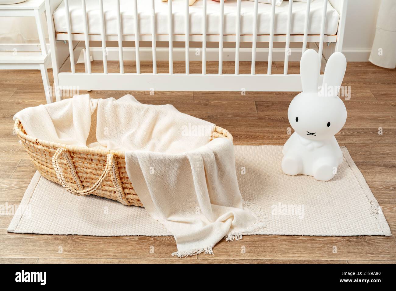 Interior of nursery room with baby crib and cradle Stock Photo - Alamy