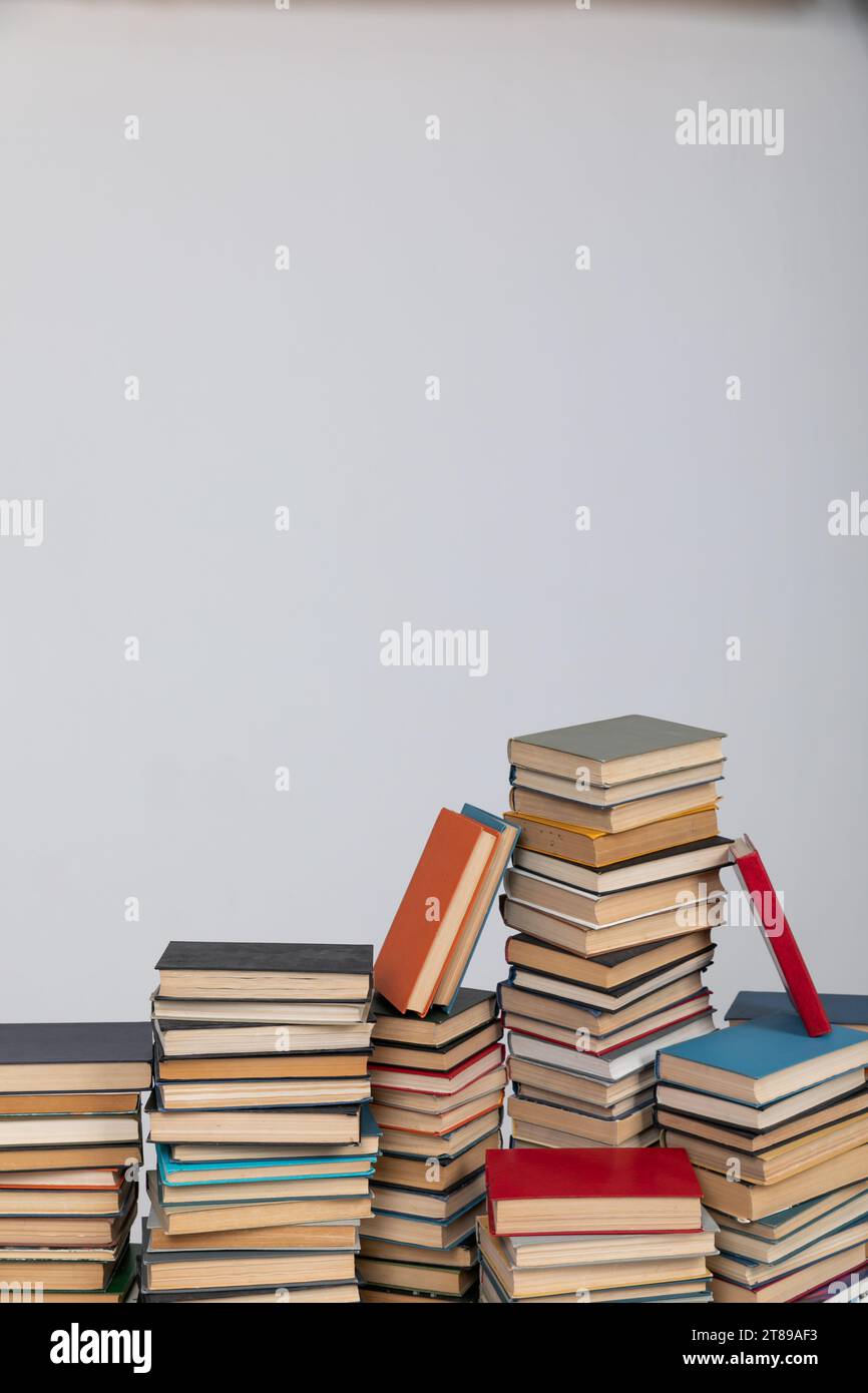 many books on a white background in the library in the office of ...