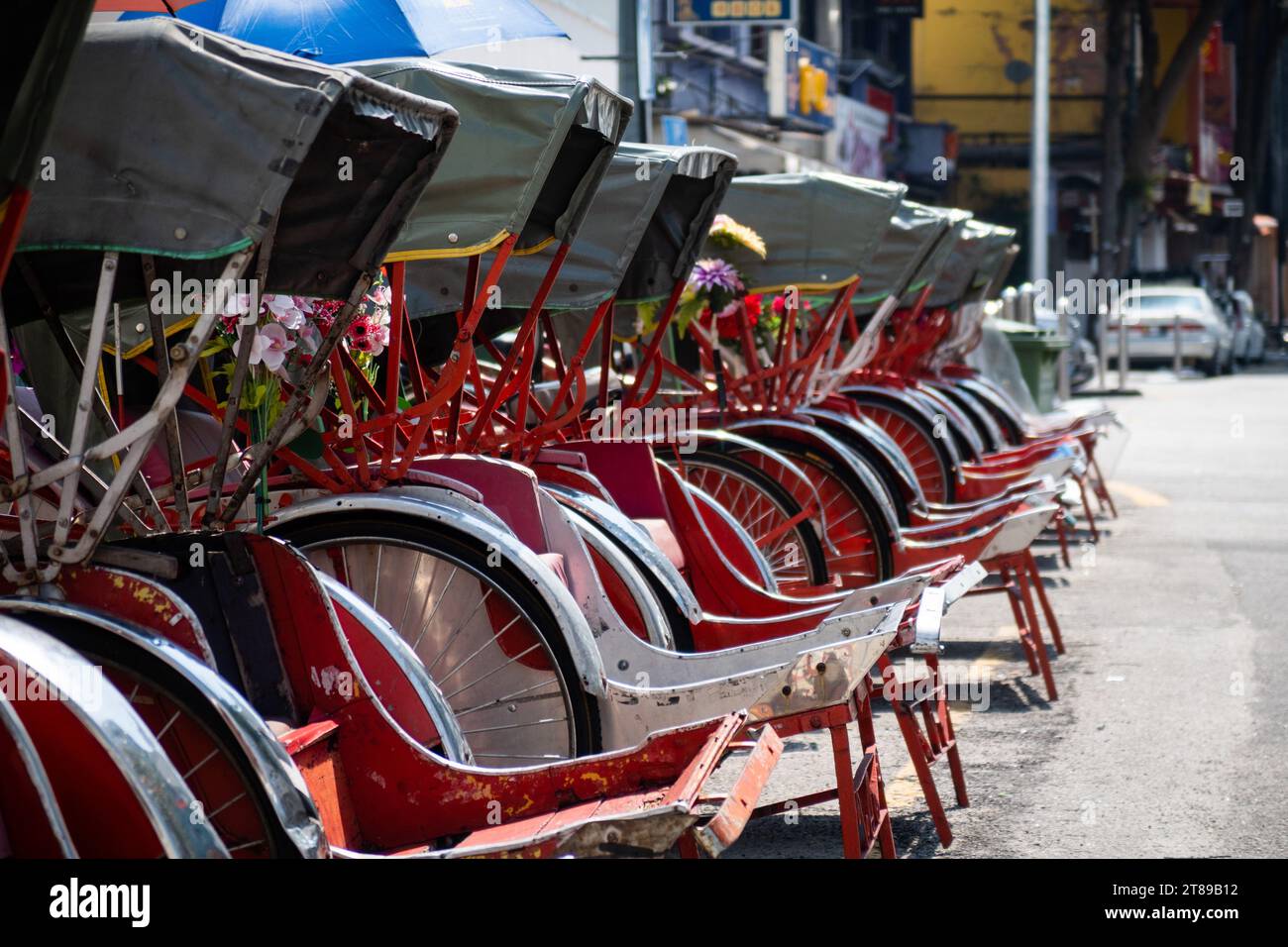 Bicycle rickshaws in George Town, Penang, Malaysia Stock Photo - Alamy