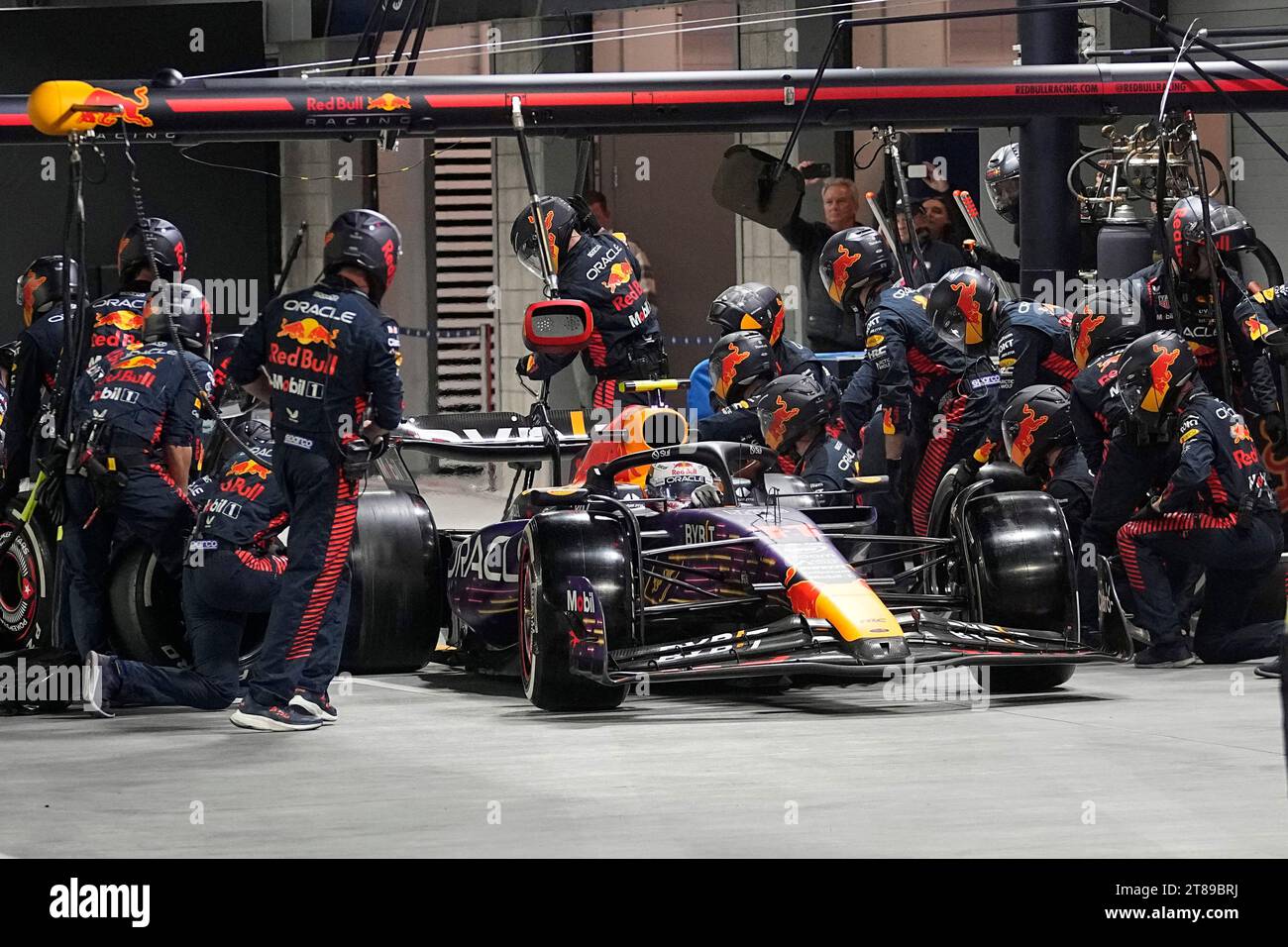 Red Bull driver Sergio Perez, of Mexico, makes a pit stop during the ...