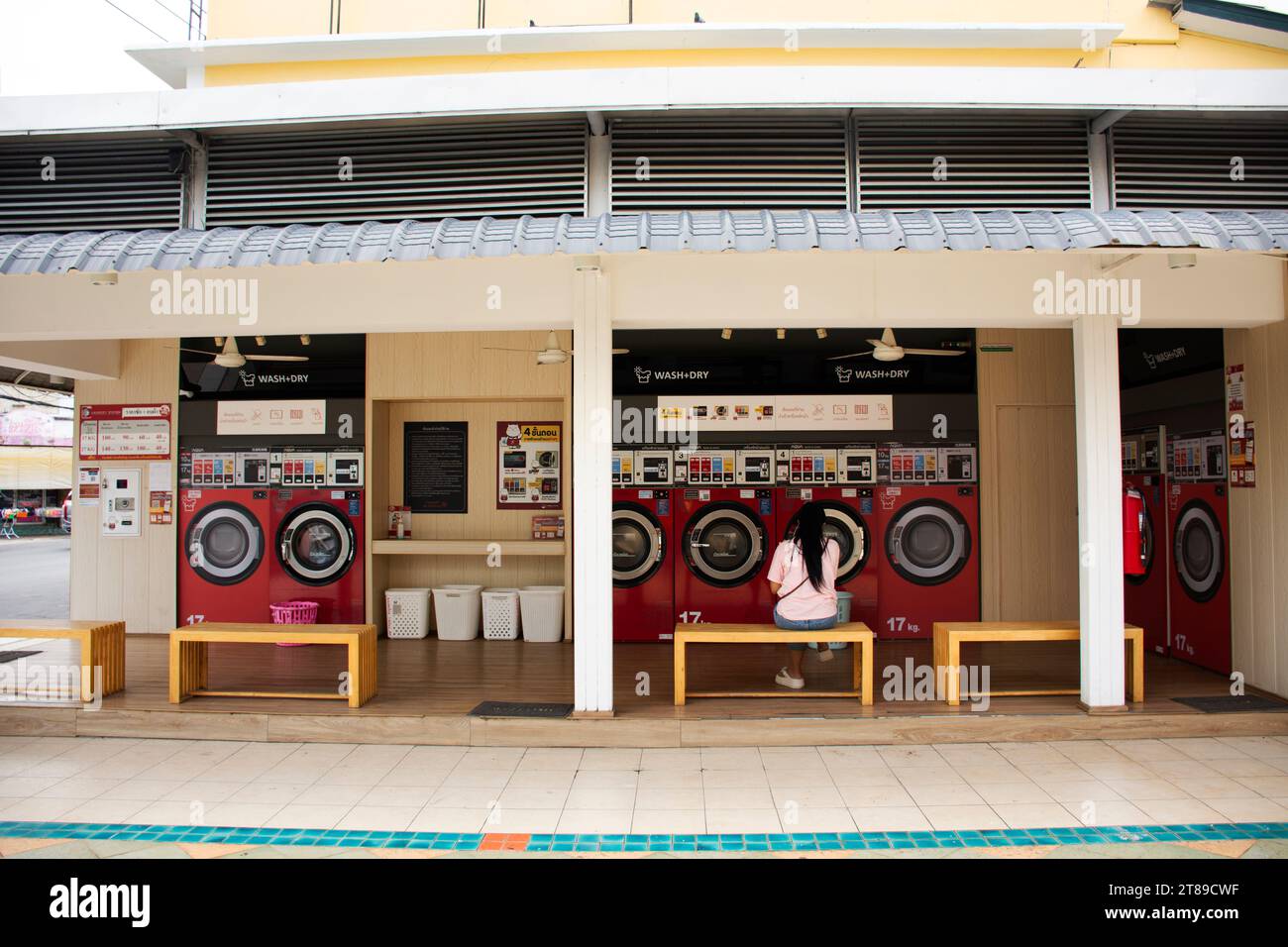 Modern building laundry laundromat shop or launderette with service ...