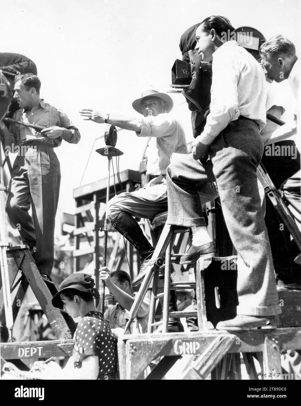 Director CECIL B. DeMILLE on set candid with Movie / Camera Crew during ...