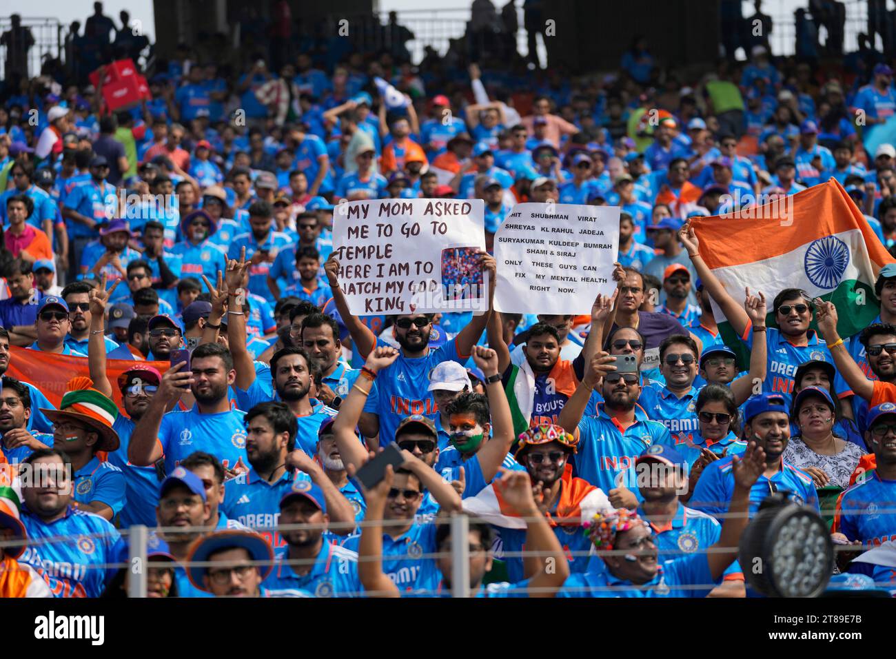Indian fans carry placards as they wait for the ICC Men's Cricket World ...