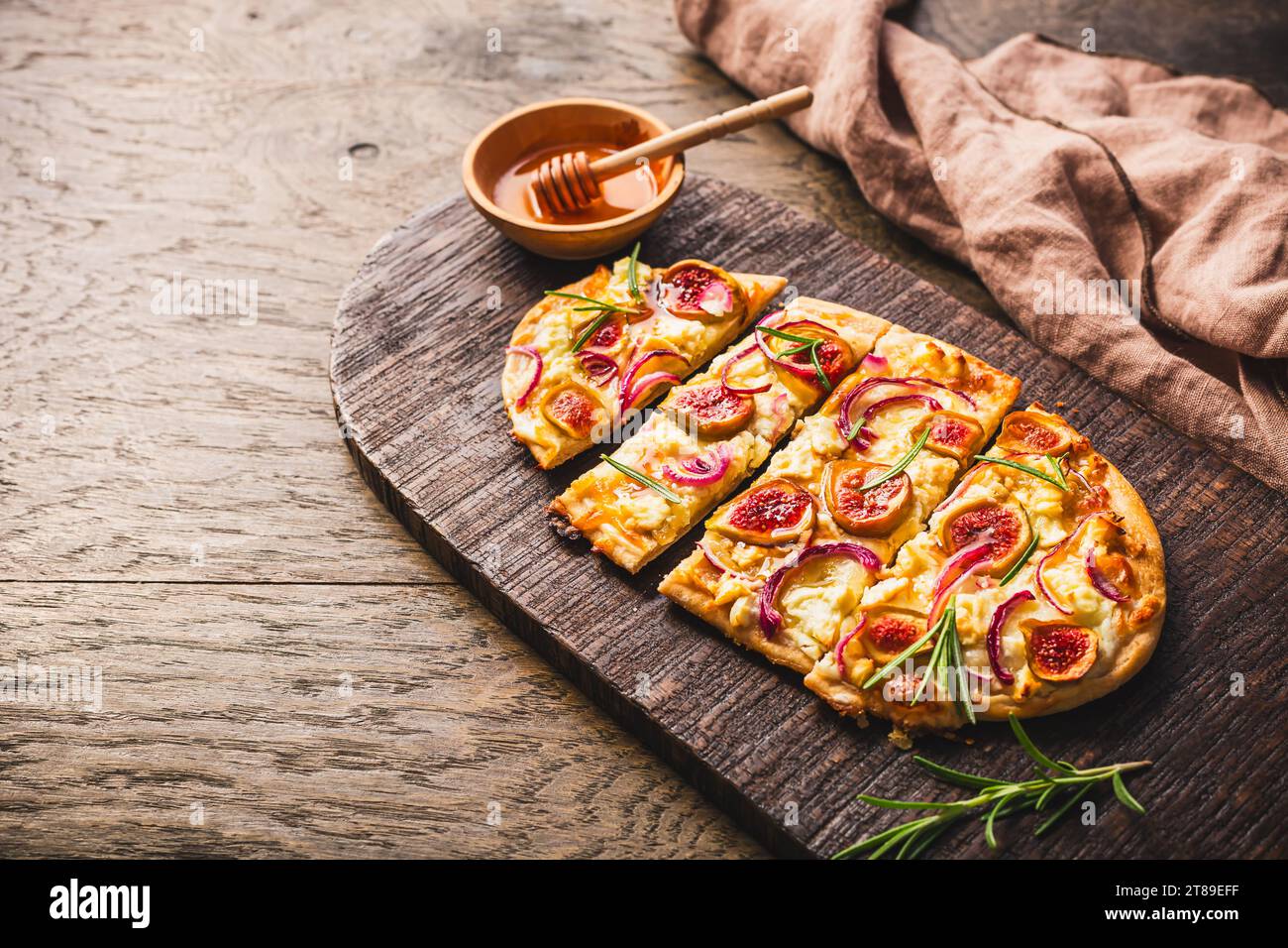 French Tarte Flambee (Flammkuchen) with figs, red onions, soft goat ...