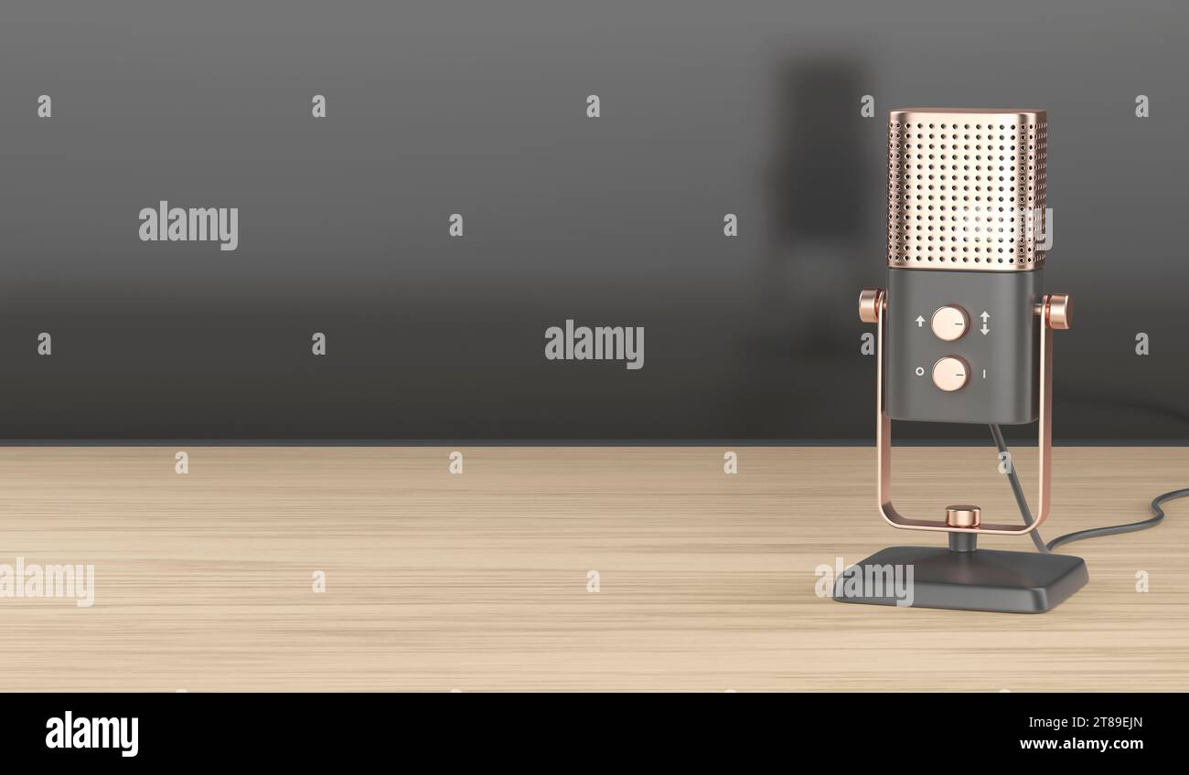 Modern studio microphone on wooden desk Stock Photo - Alamy