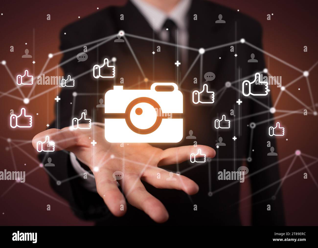Hand holding social media icons Stock Photo - Alamy