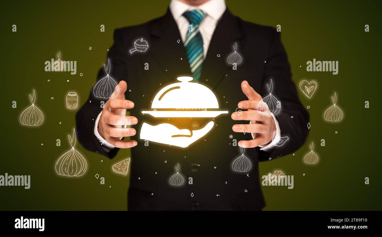 Hand holding food related icons Stock Photo - Alamy