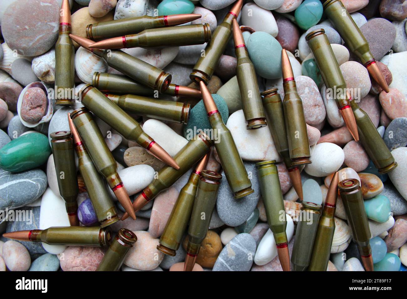 Pattern Of Scattered Bullets On A Round Smooth Rocks Top View Stock ...