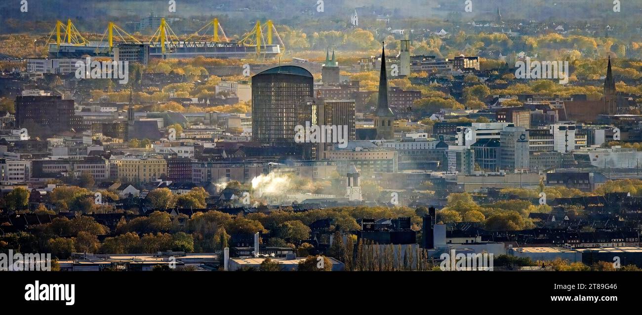 Aerial view, skyline of Dortmund city, hazy distant view with smoke ...