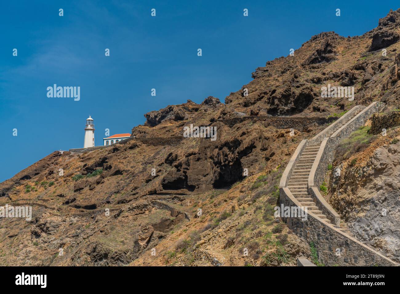 Walking way to the lighthouse, rocky coastal landscapes of Santo Antao ...