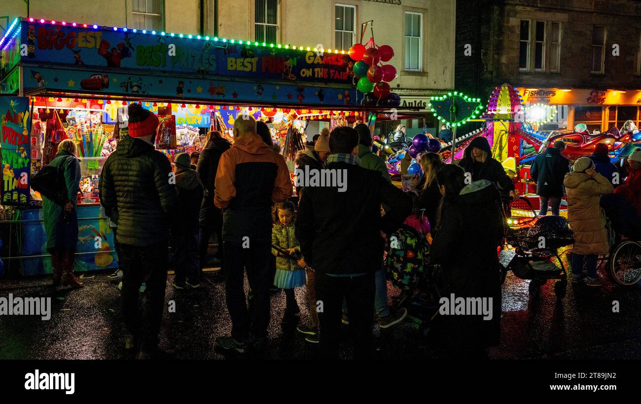 Colourful stall at a Christmas street market and fun fare in Lanark ...