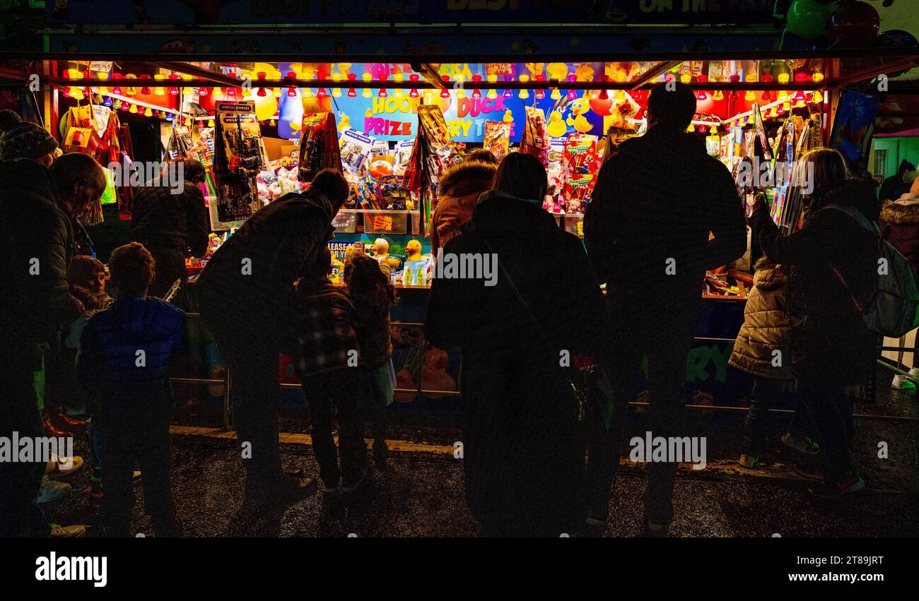 Colourful stall at a Christmas street market and fun fare in Lanark ...