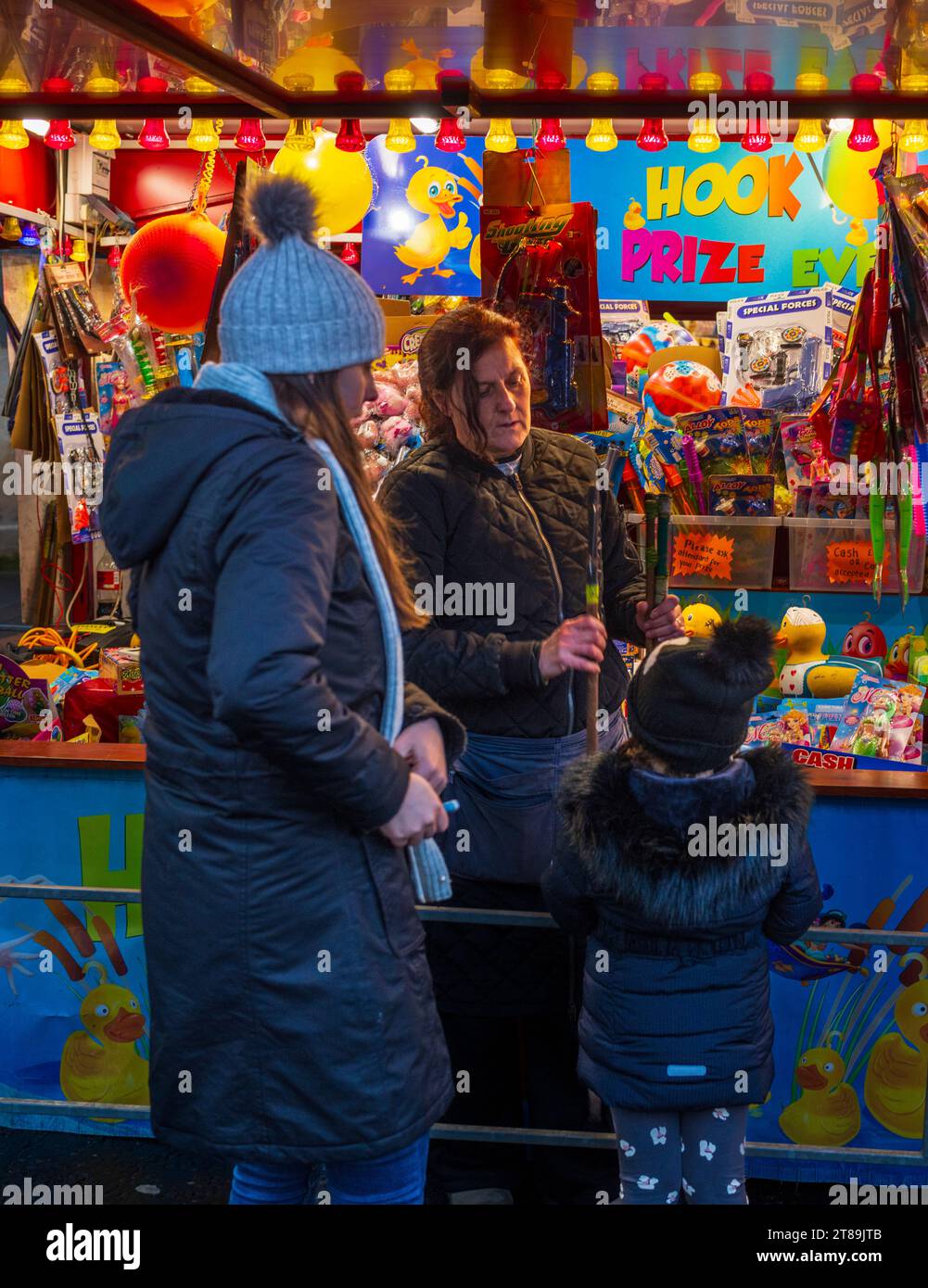 Colourful stall at a Christmas street market and fun fare in Lanark ...