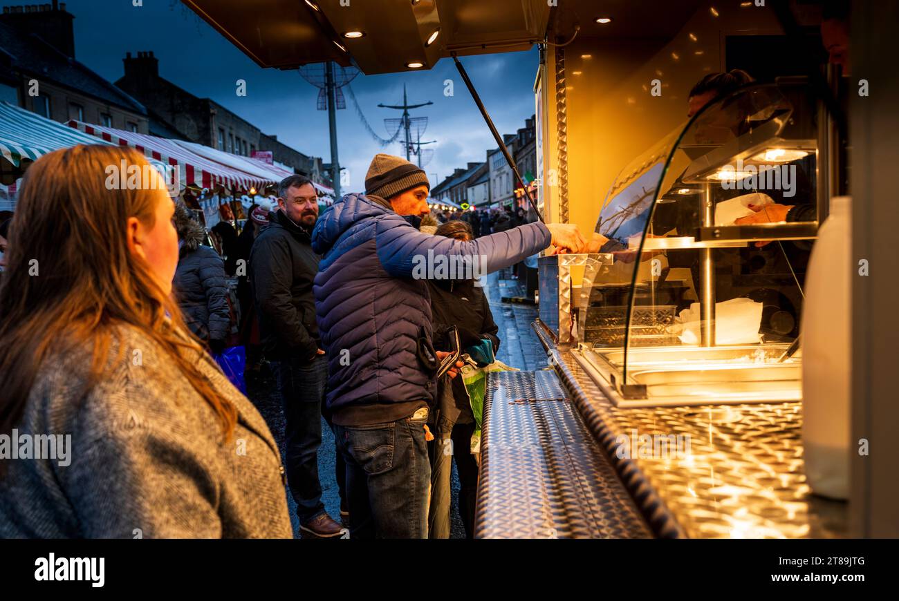 Food stall at a Christmas street market in Lanark, Scotland Stock Photo ...