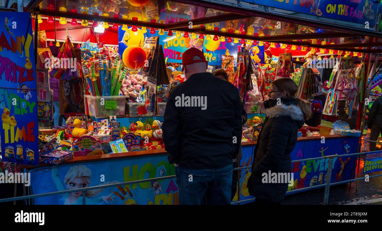 Colourful stall at a Christmas street market and fun fare in Lanark ...