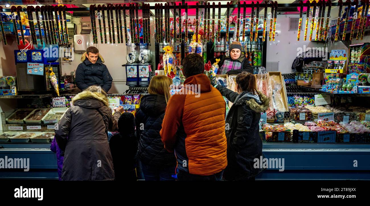 Colourful stall at a Christmas street market and fun fare in Lanark ...