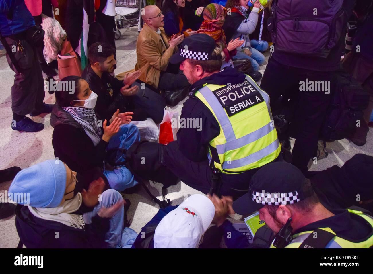 London, UK. 18th November 2023. Police officers issue a prohibition ...