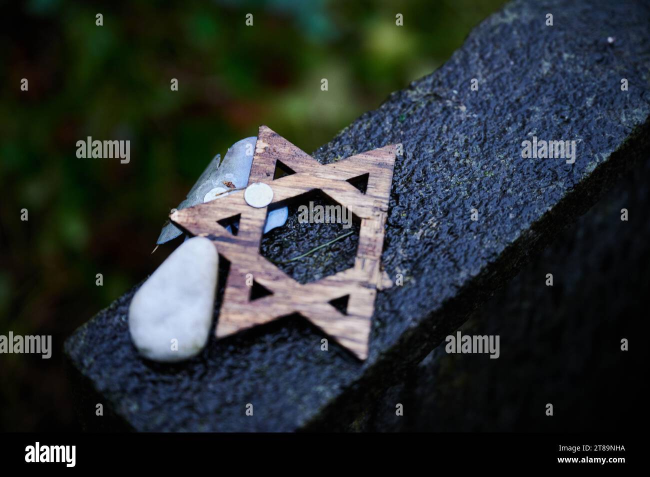 Berlin, Germany. 19th Nov, 2023. A broken Star of David lies on a ...