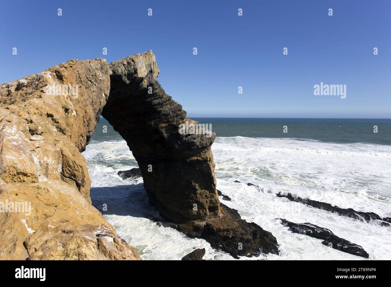 A view of Bogenfels arch at Luderitz, Namibia Stock Photo - Alamy