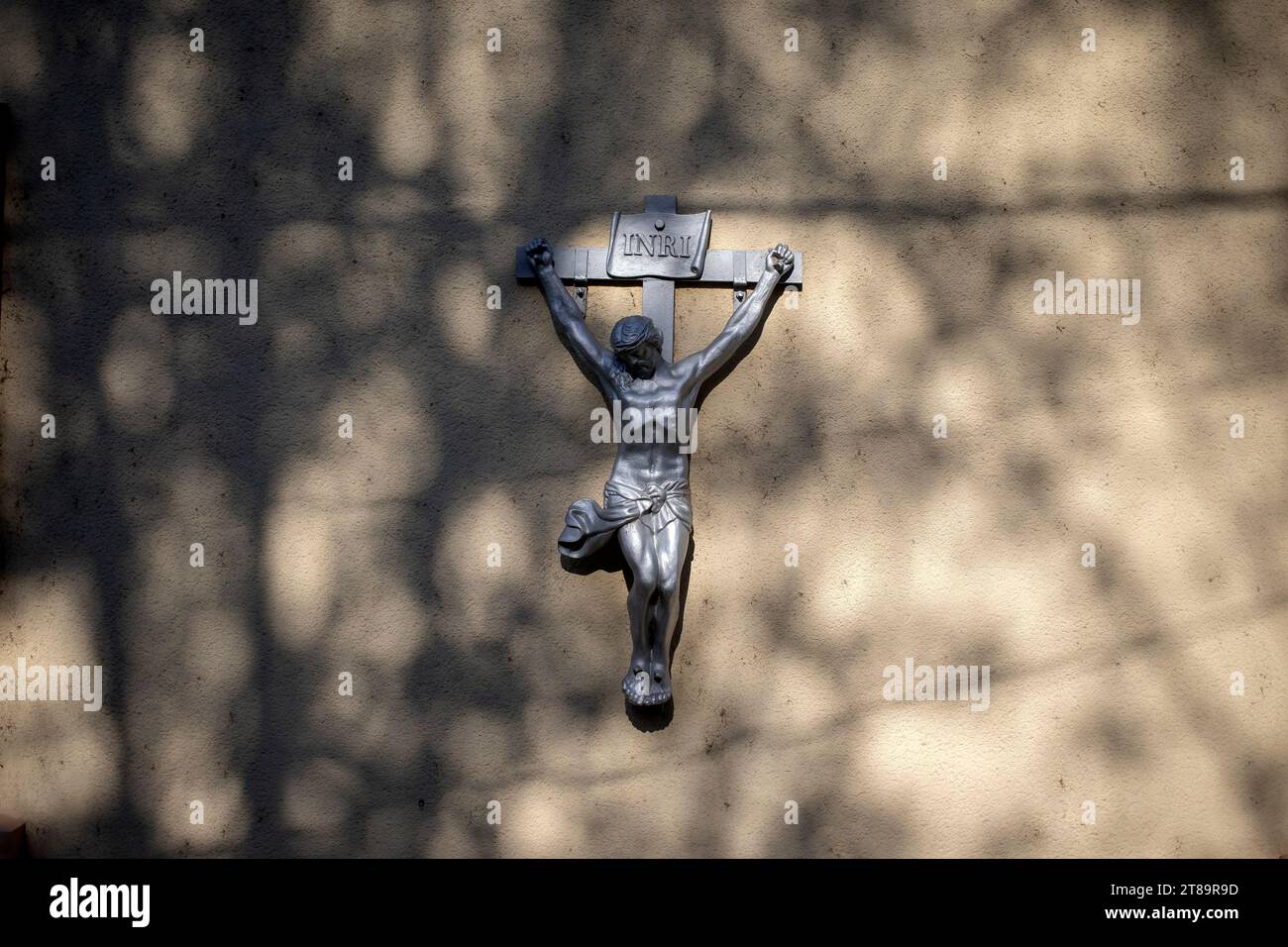 Jesus crucified figure on the wall of the Monastery of St. John the Baptist and Anthony in Zemun ...