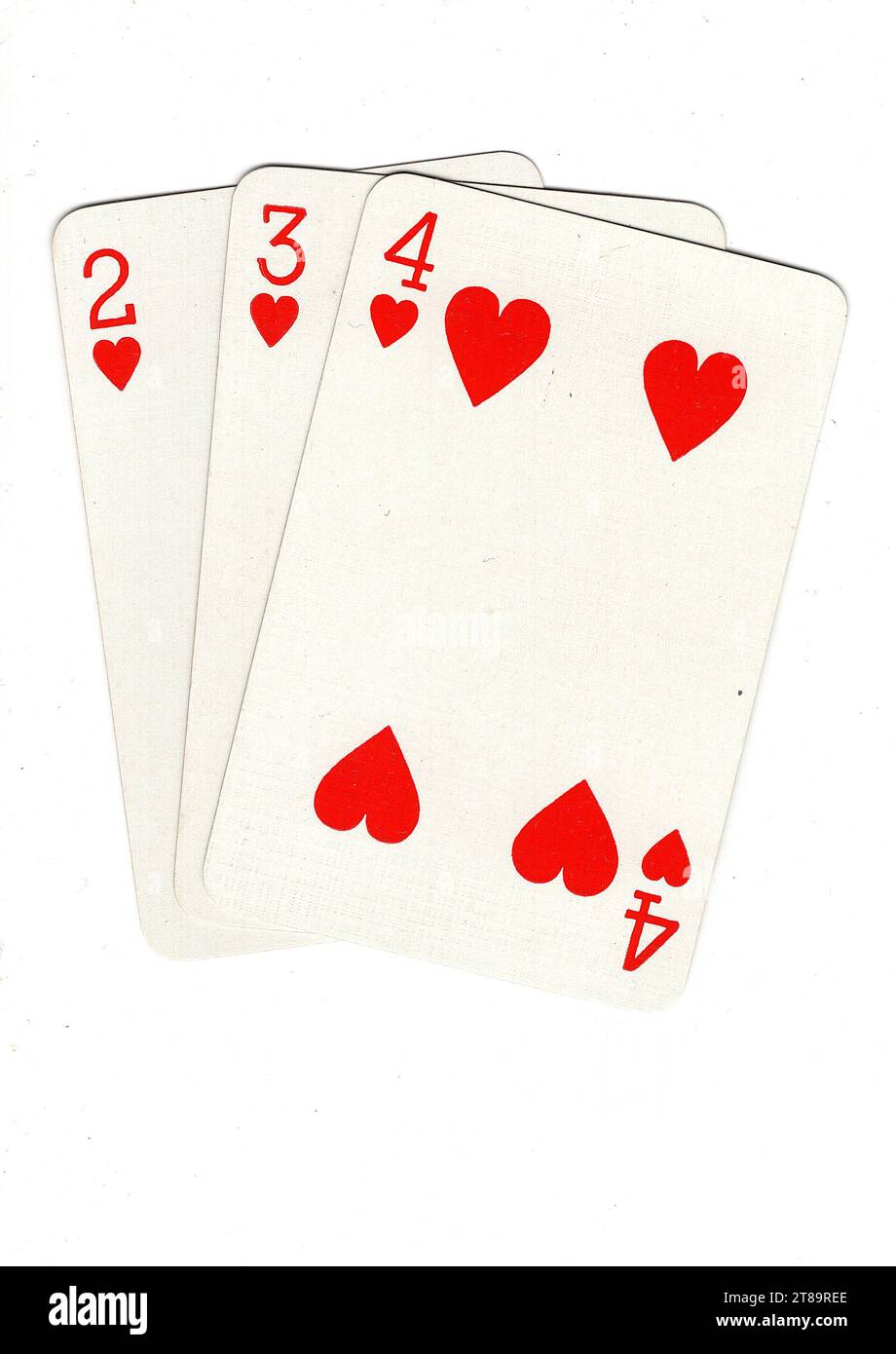 Antique playing cards showing a three card run of two, three and four ...