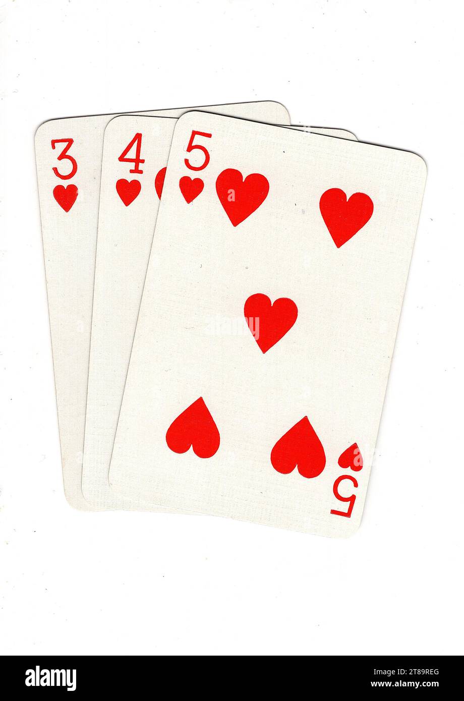 Antique playing cards showing a three card run of three, four and five ...