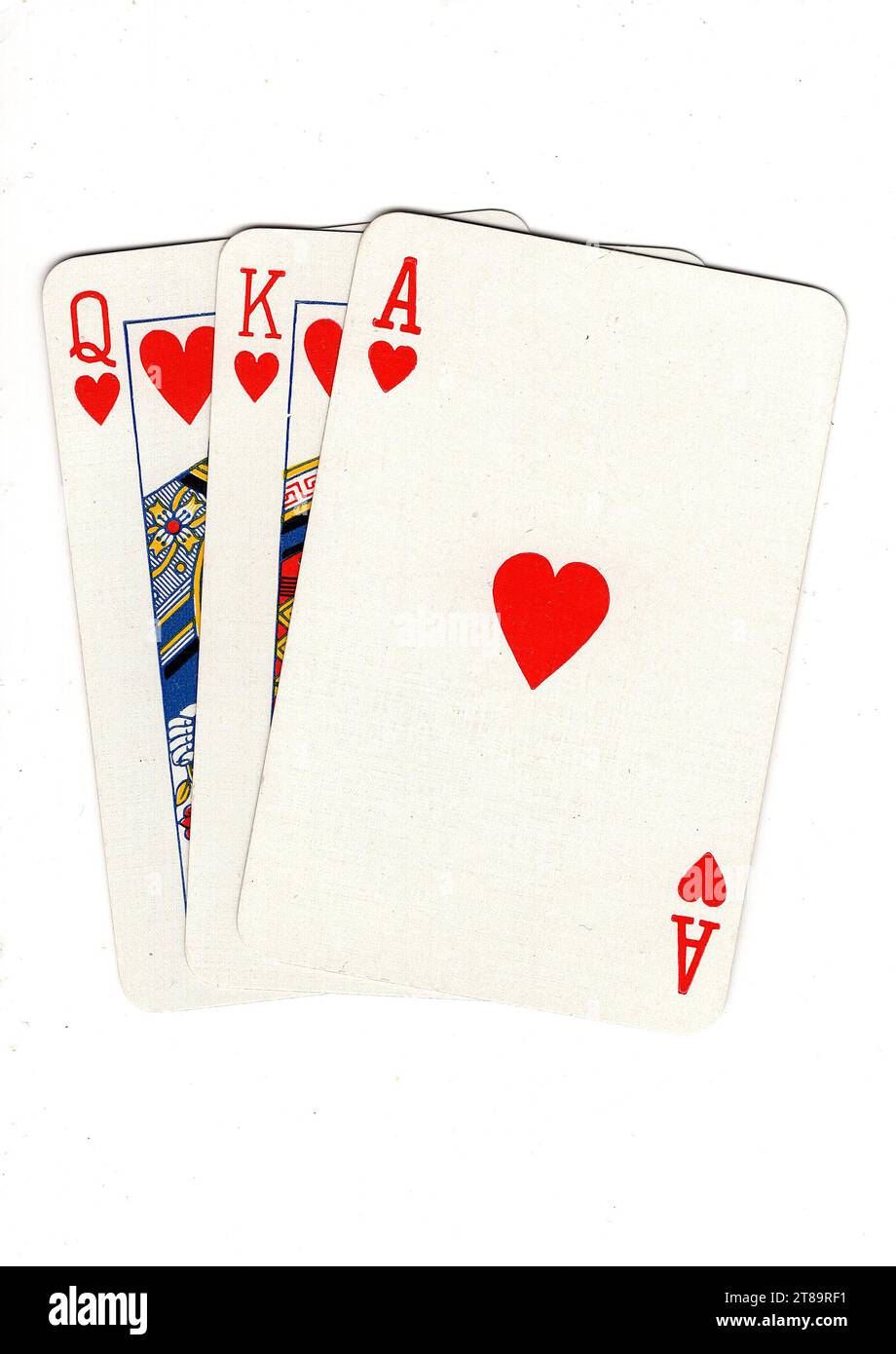 Antique playing cards showing a three card run of queen, king and ace ...