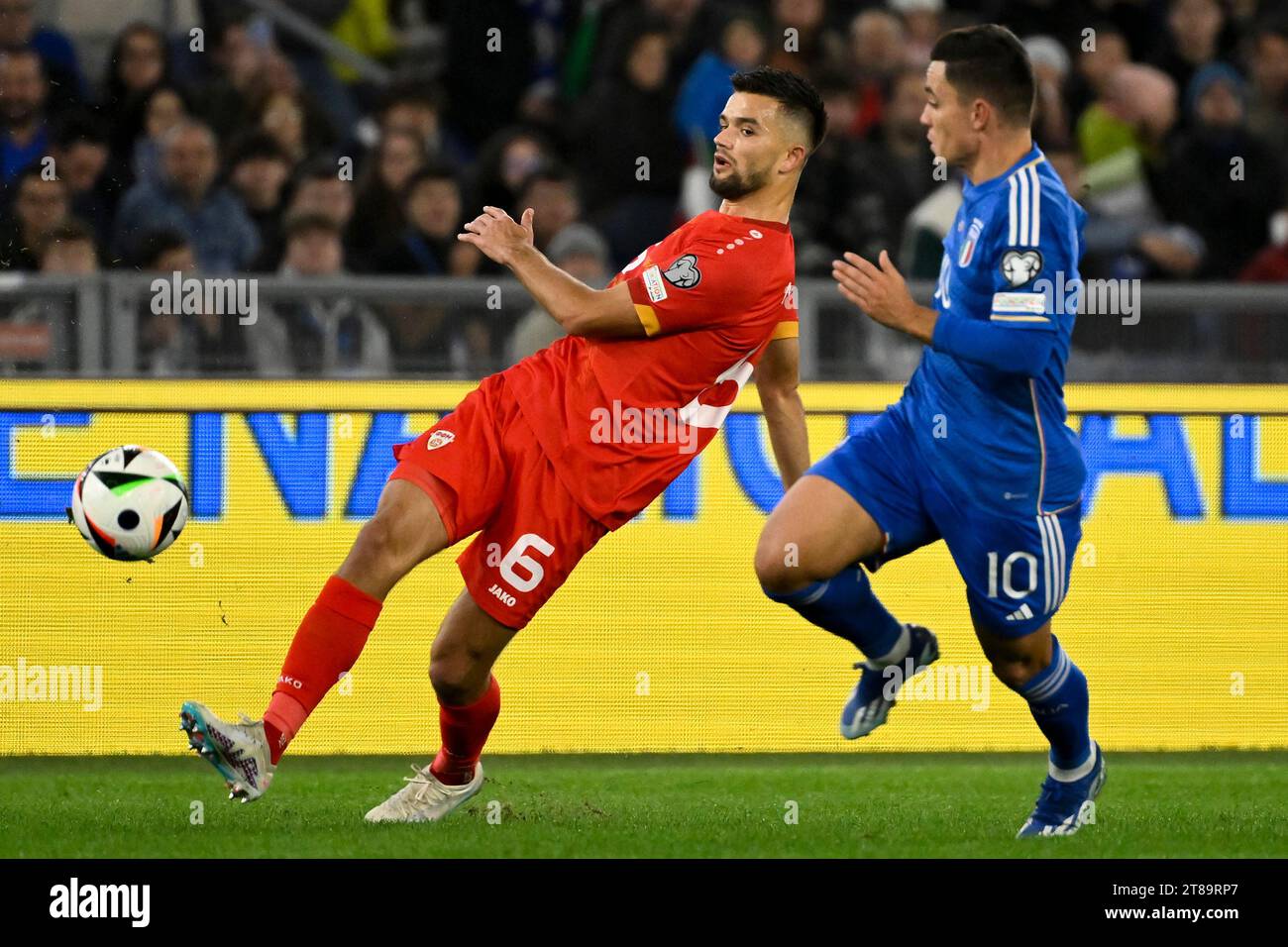 Visar Musliu of North Macedonia and Giacomo Raspadori of Italy during ...