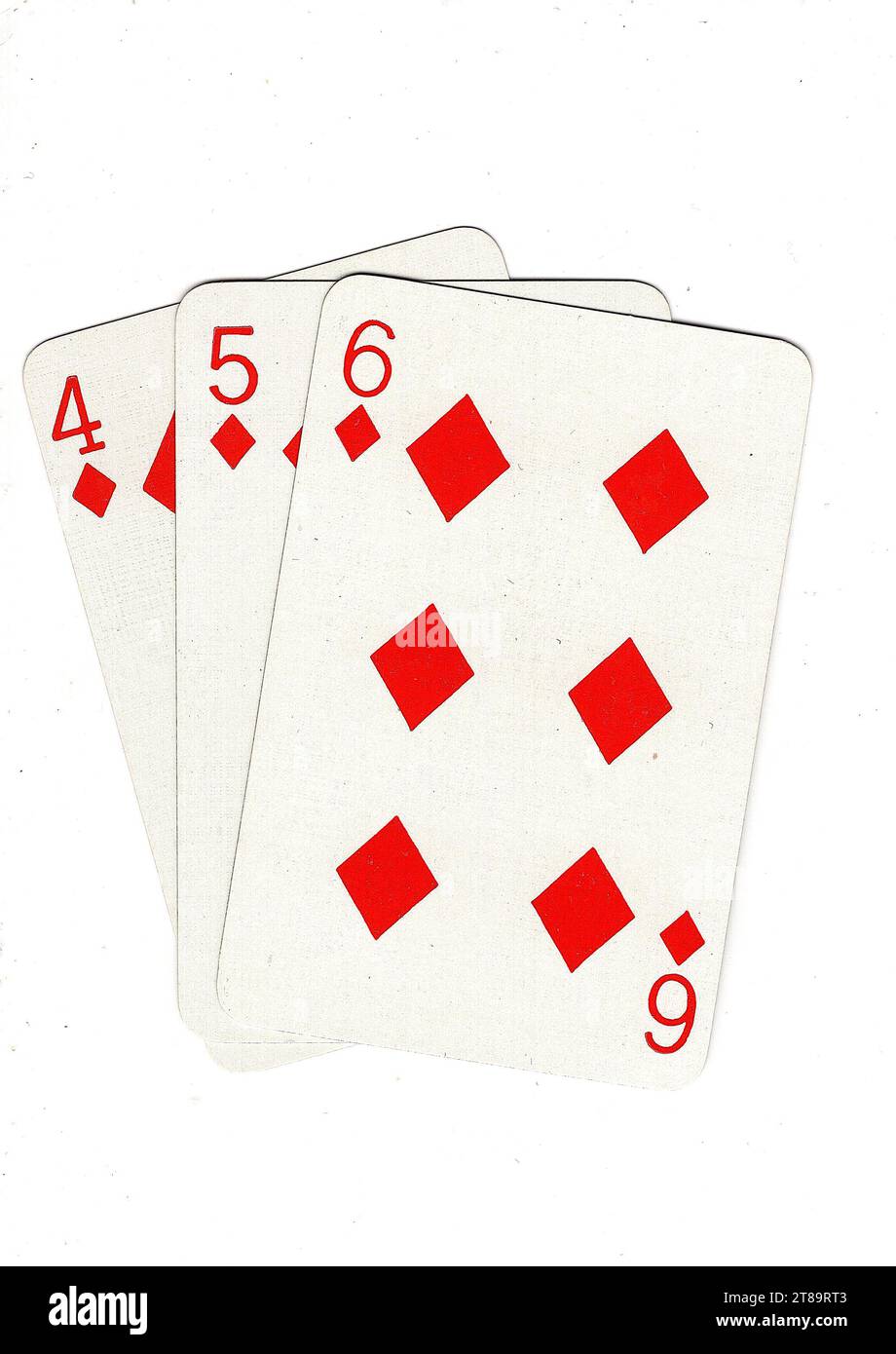 Antique playing cards showing a three card run of four, five and six of ...