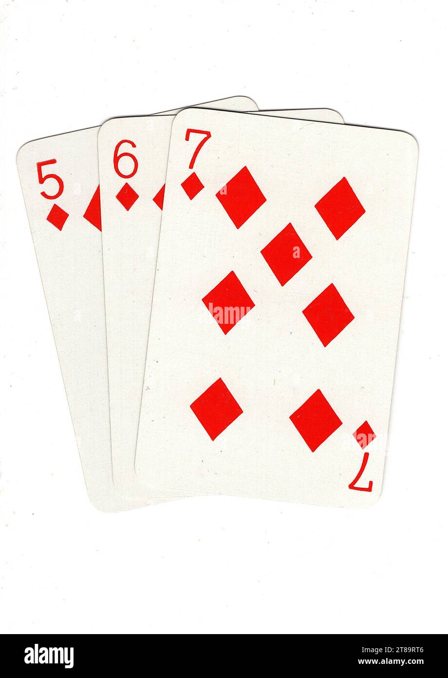Antique playing cards showing a three card run of five, six and seven ...