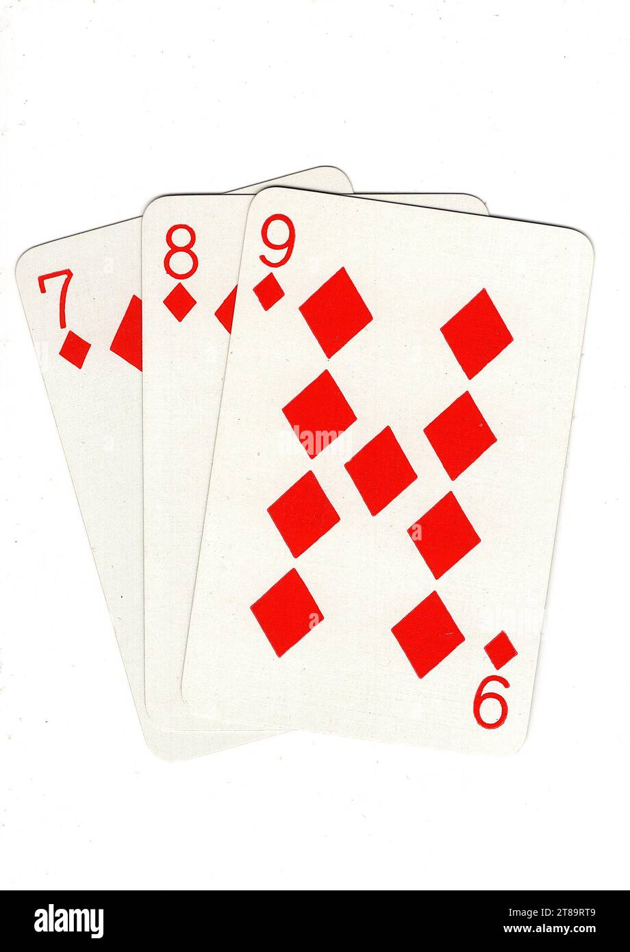 Antique playing cards showing a three card run of seven, eight and nine ...