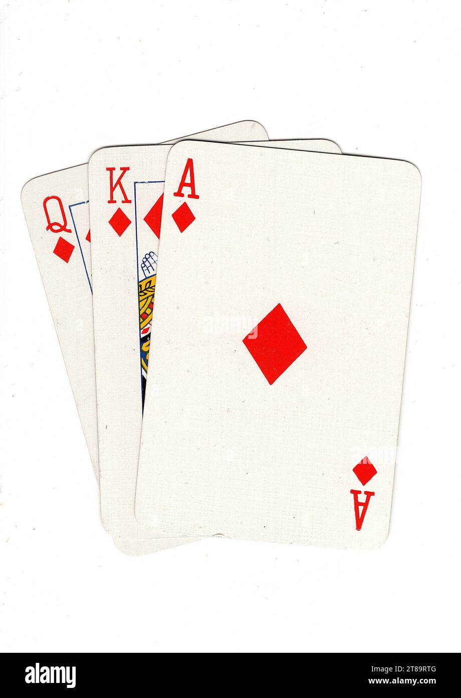 Antique playing cards showing a three card run of queen, king and ace ...