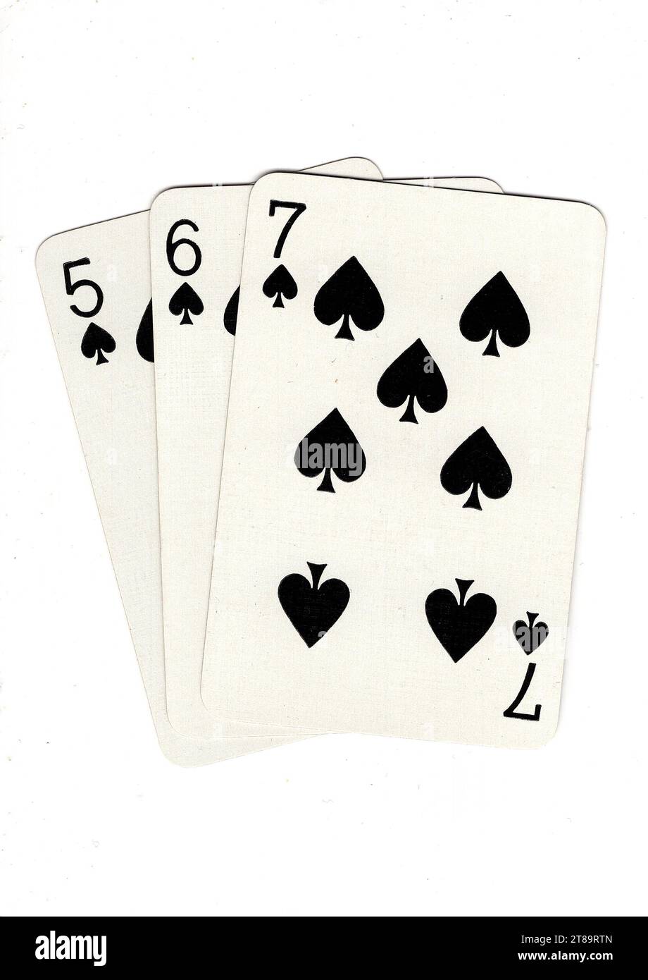 Antique playing cards showing a three card run of five, six and seven ...
